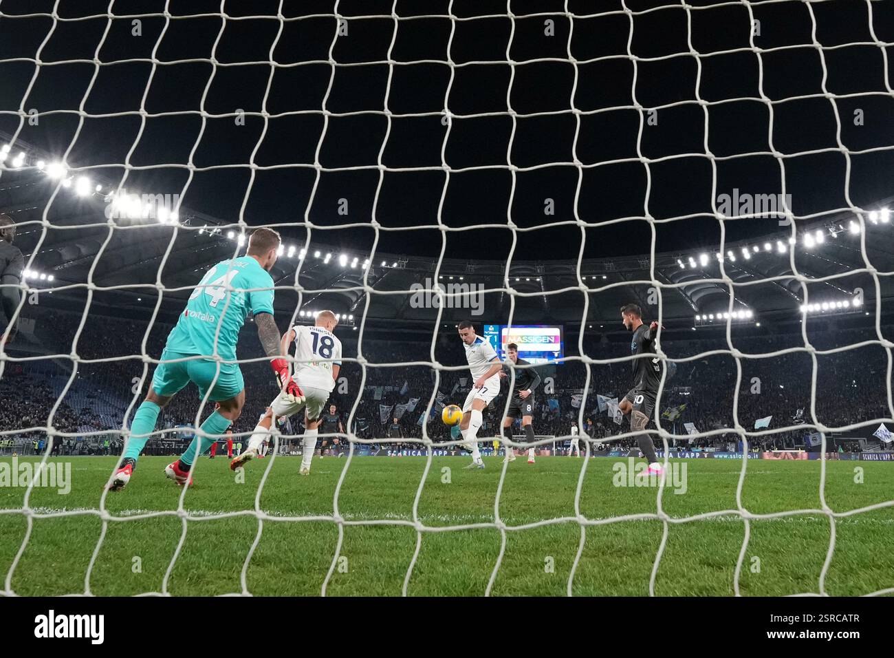 Lazio's Adam Marusic, center, scores an own goal during a Serie A ...