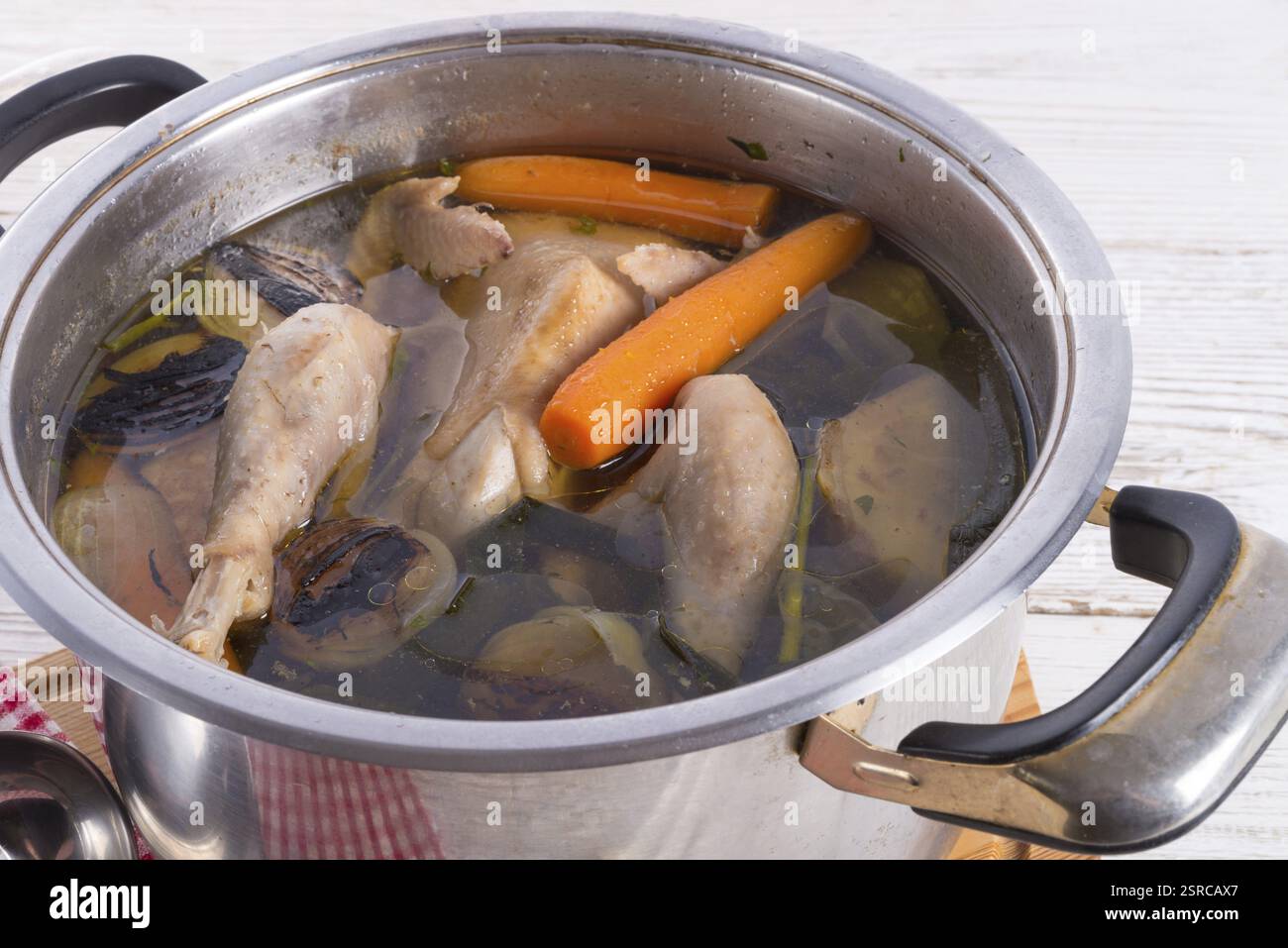 Chicken in the pot Stock Photo - Alamy