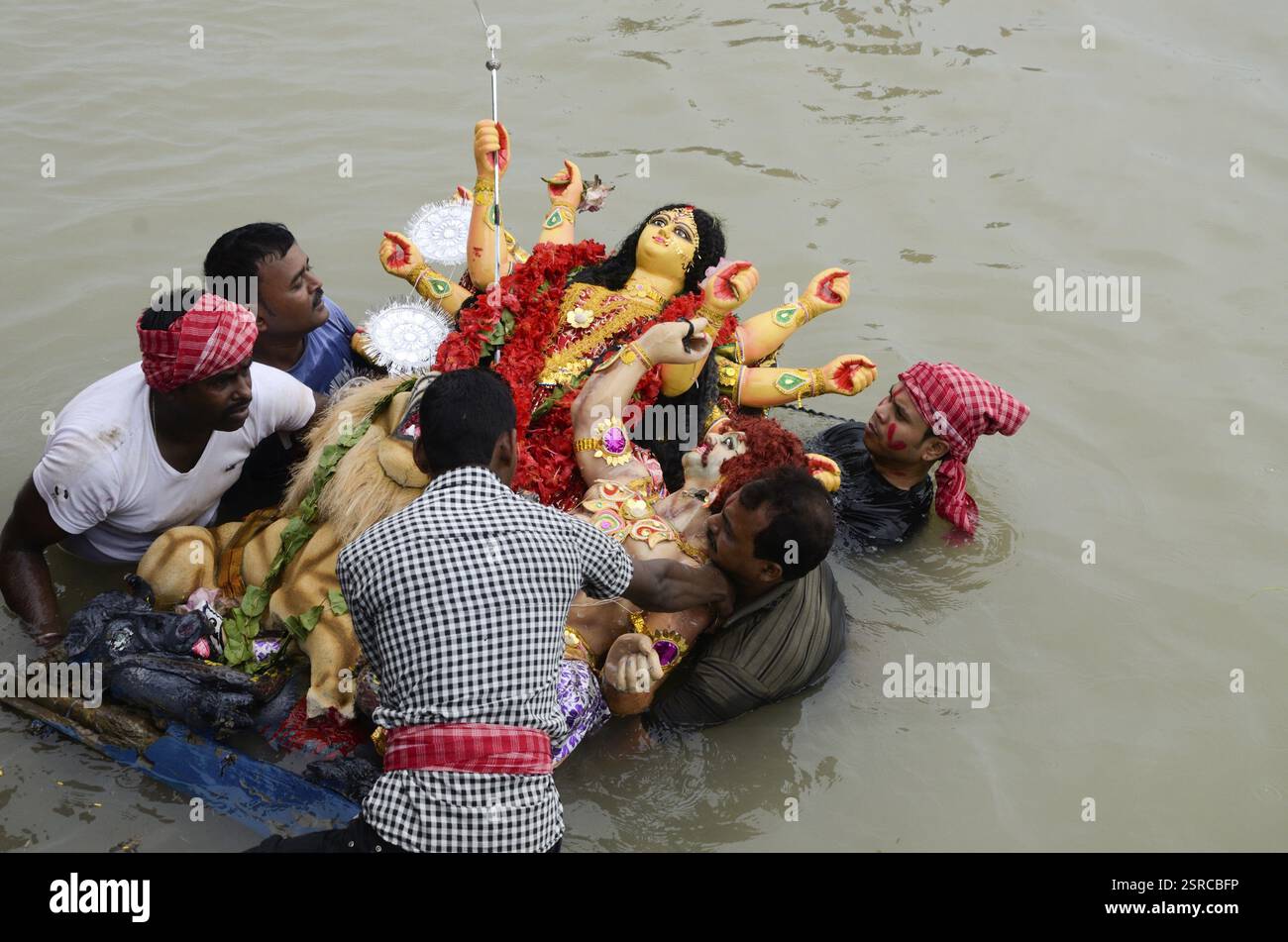 Immersion of durga idol, Hooghly river, Kolkata, West Bengal, India, Asia Stock Photo - Alamy