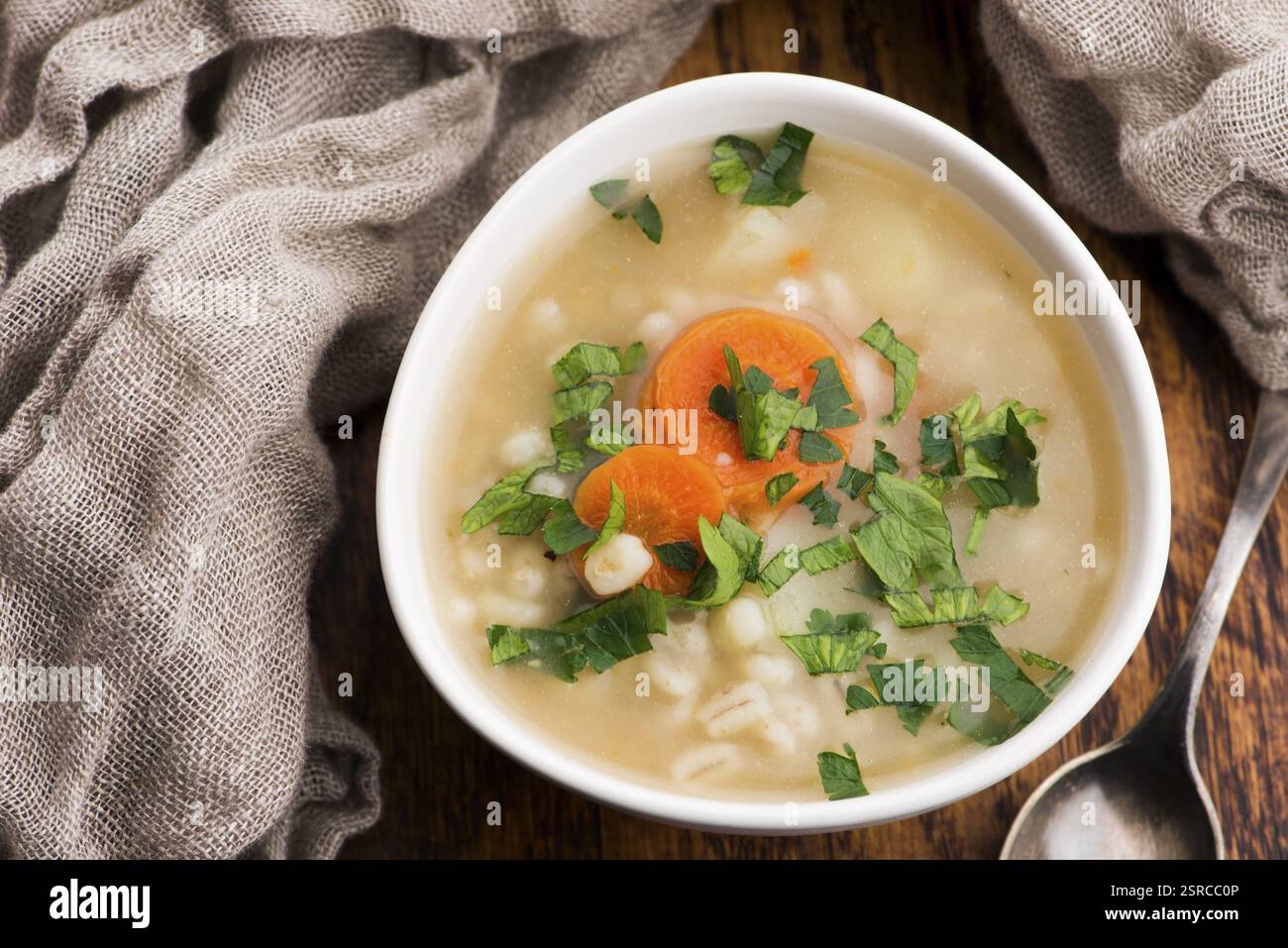 Barley soup, pearl barley in white bowl Stock Photo - Alamy