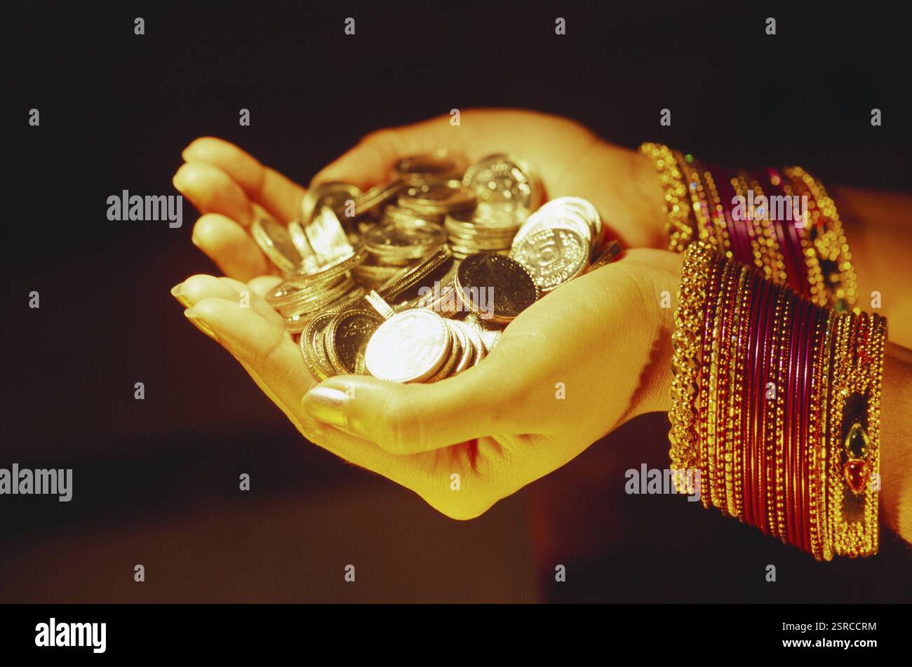 Palm with coins hi-res stock photography and images - Alamy