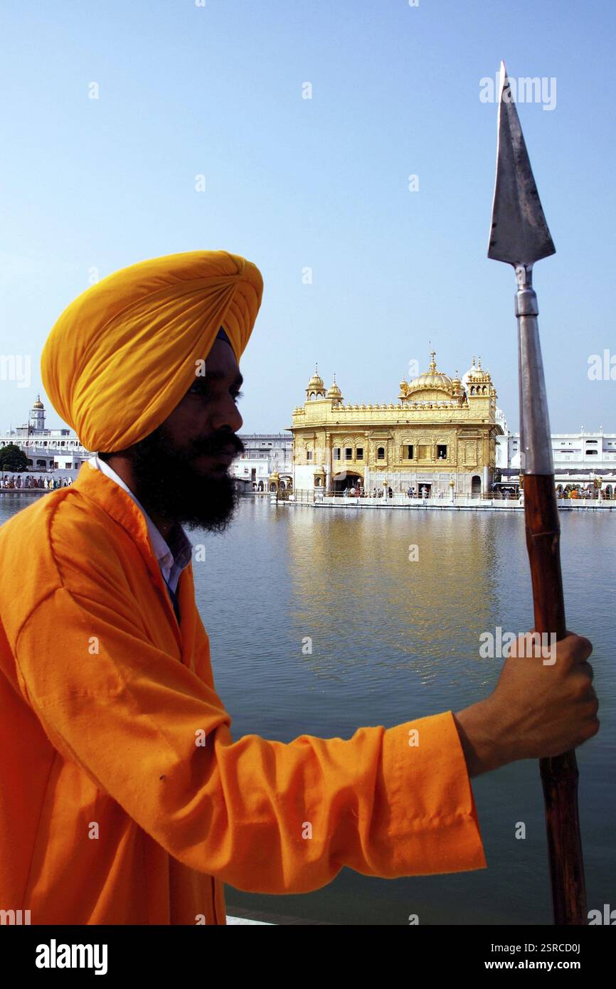 Guard in front of golden temple, Amritsar, Punjab, India, Asia Stock ...