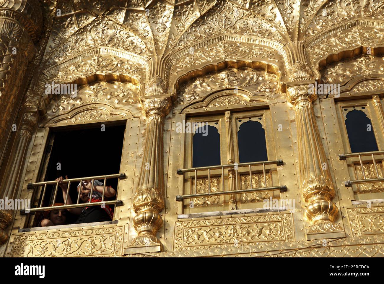 Gold plated windows and pillars of Golden temple, Amritsar, Punjab ...