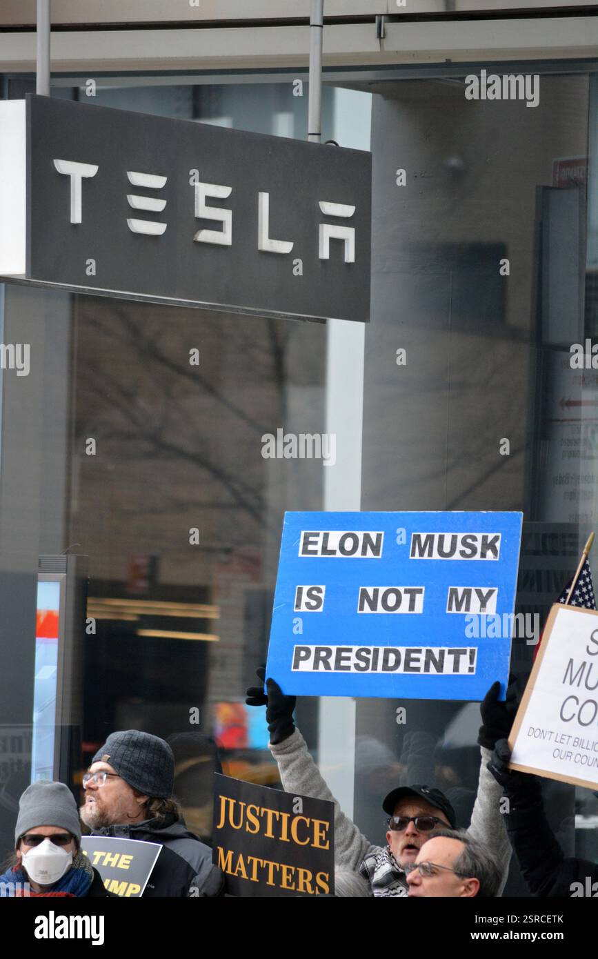 Demonstrators taking part in a "Tesla Takeover" event against Elon Musk ...