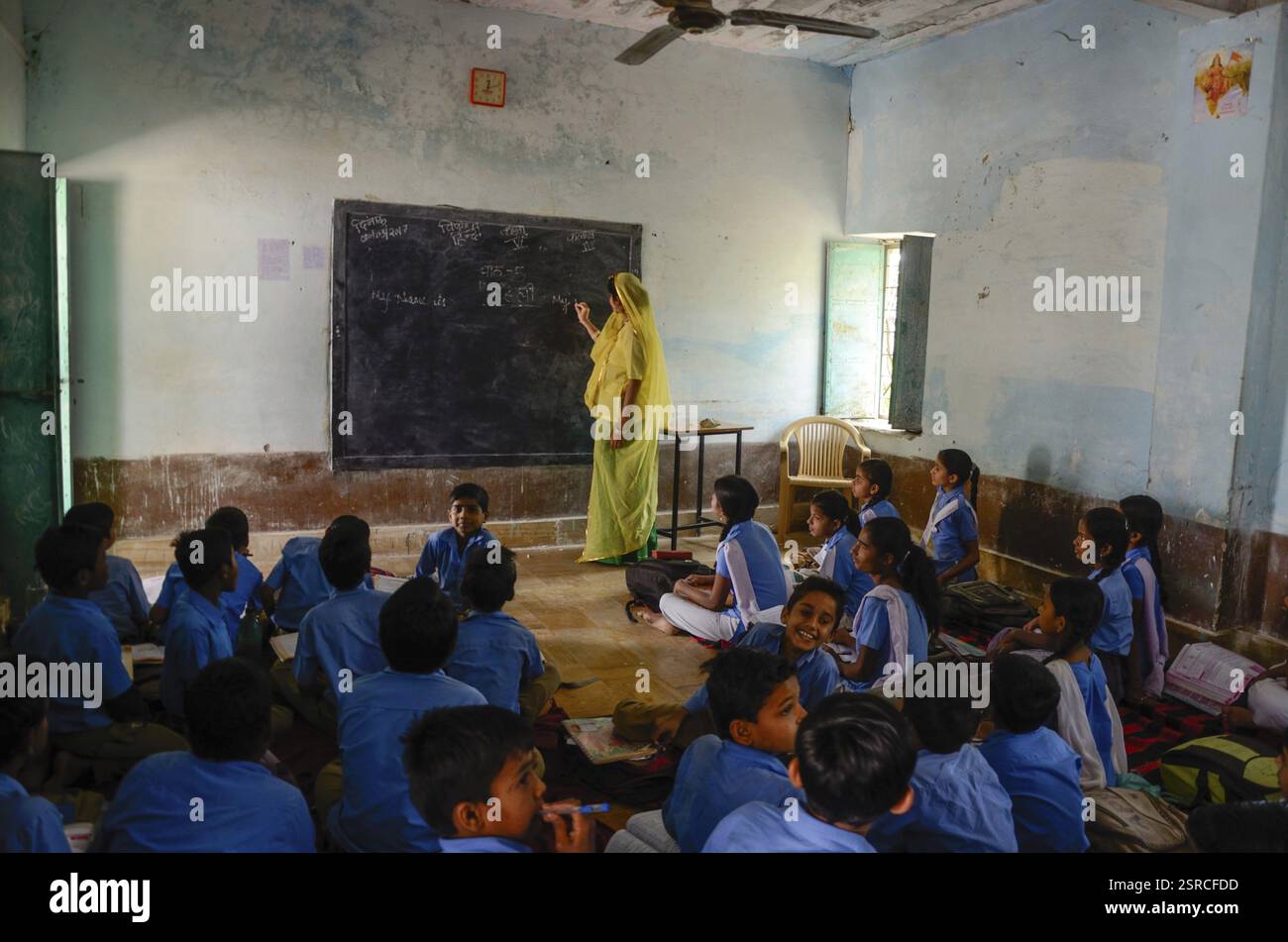 Teacher teaching students in school class room, Jaisalmer, Rajasthan ...