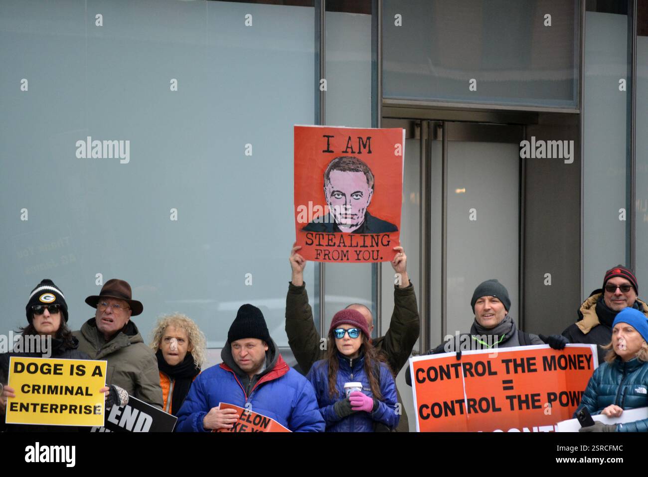 Demonstrators taking part in a "Tesla Takeover" event against Elon Musk ...