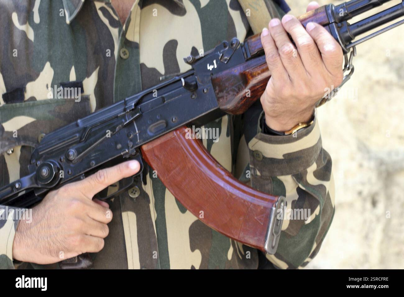 Black Cat commando with an AK 47 light machine gun MR#725 Stock Photo ...