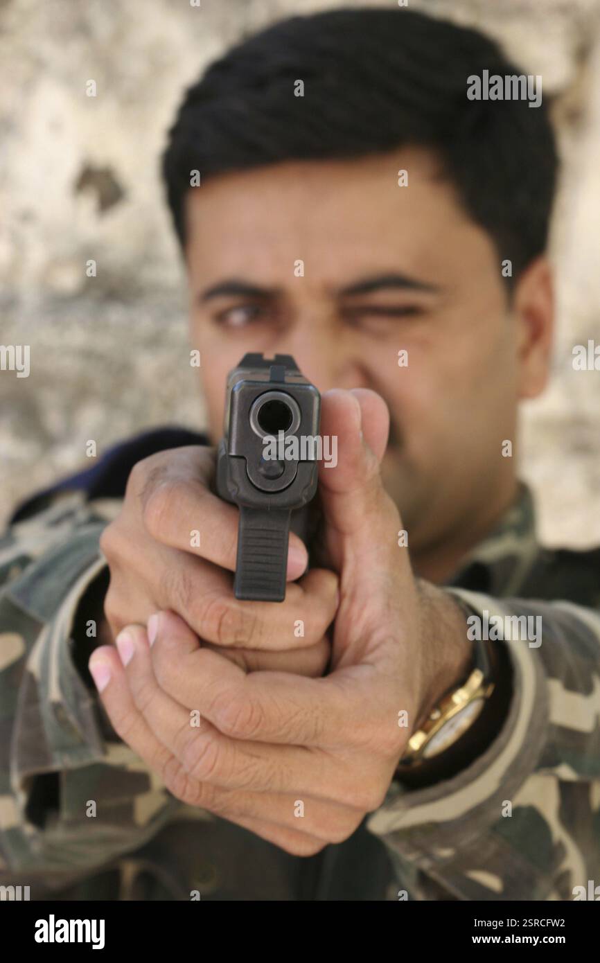 Black Cat commando with a revolver, Glock, India MR#725 Stock Photo - Alamy