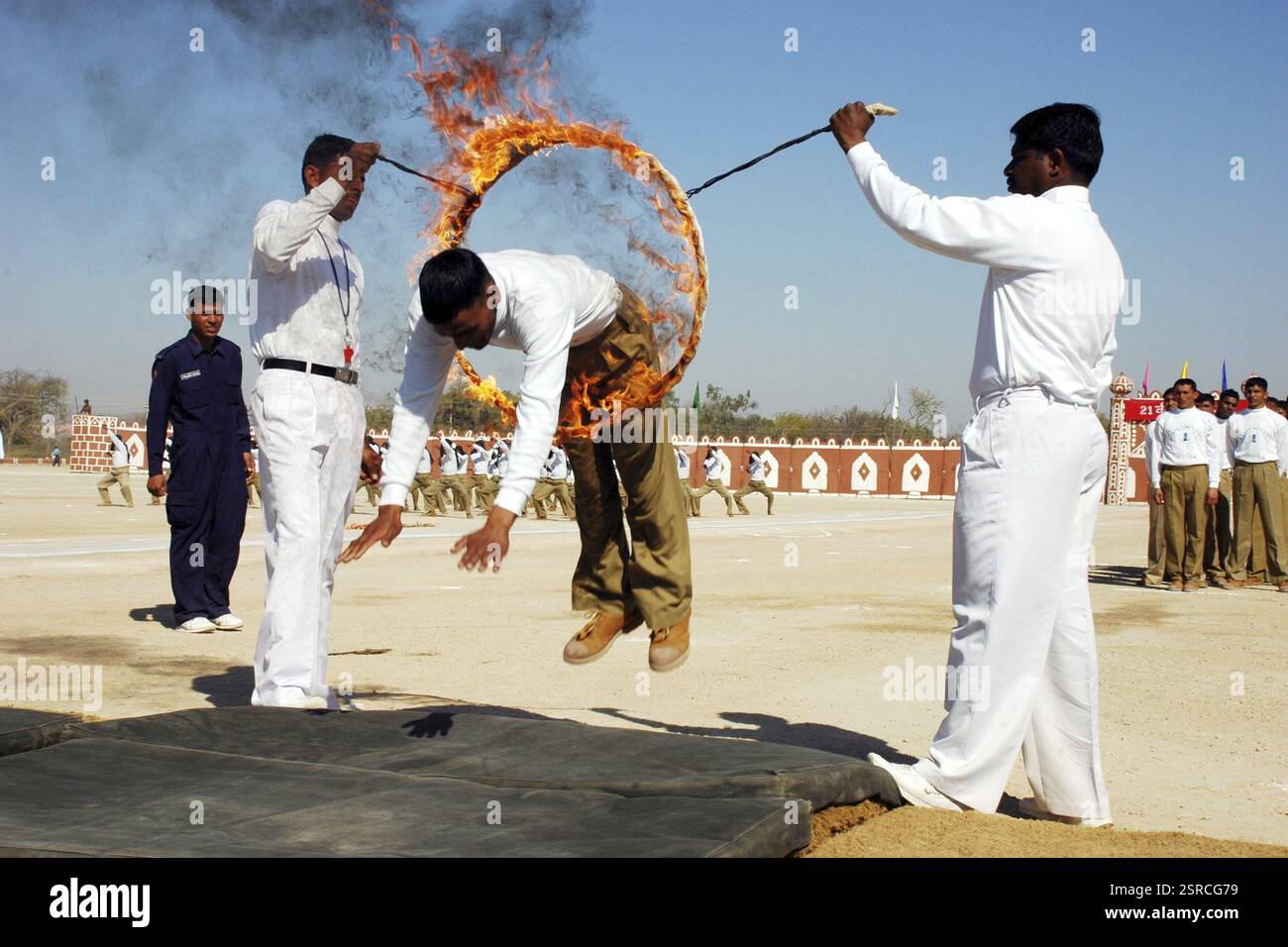 Policeman diving through fire ring, Jodhpur, Rajasthan, India, Asia ...