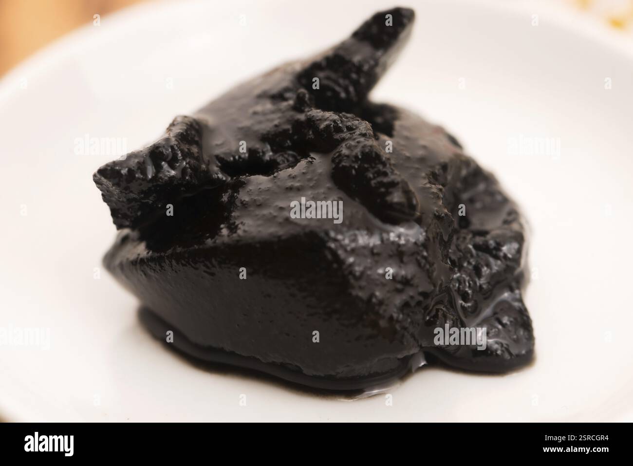 Black sesame paste Stock Photo - Alamy