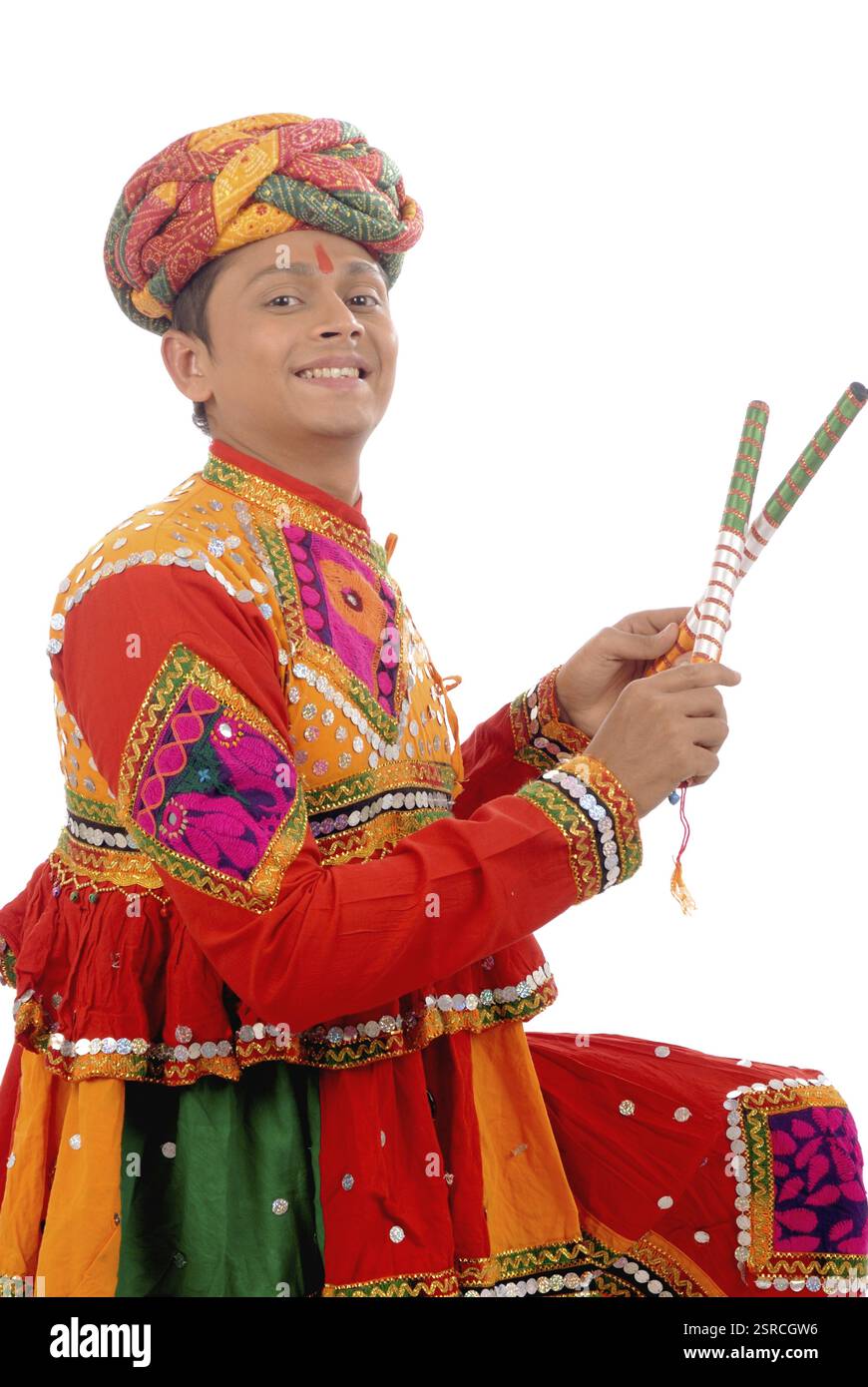 Rajasthani man playing dandiya MR#782W Stock Photo - Alamy