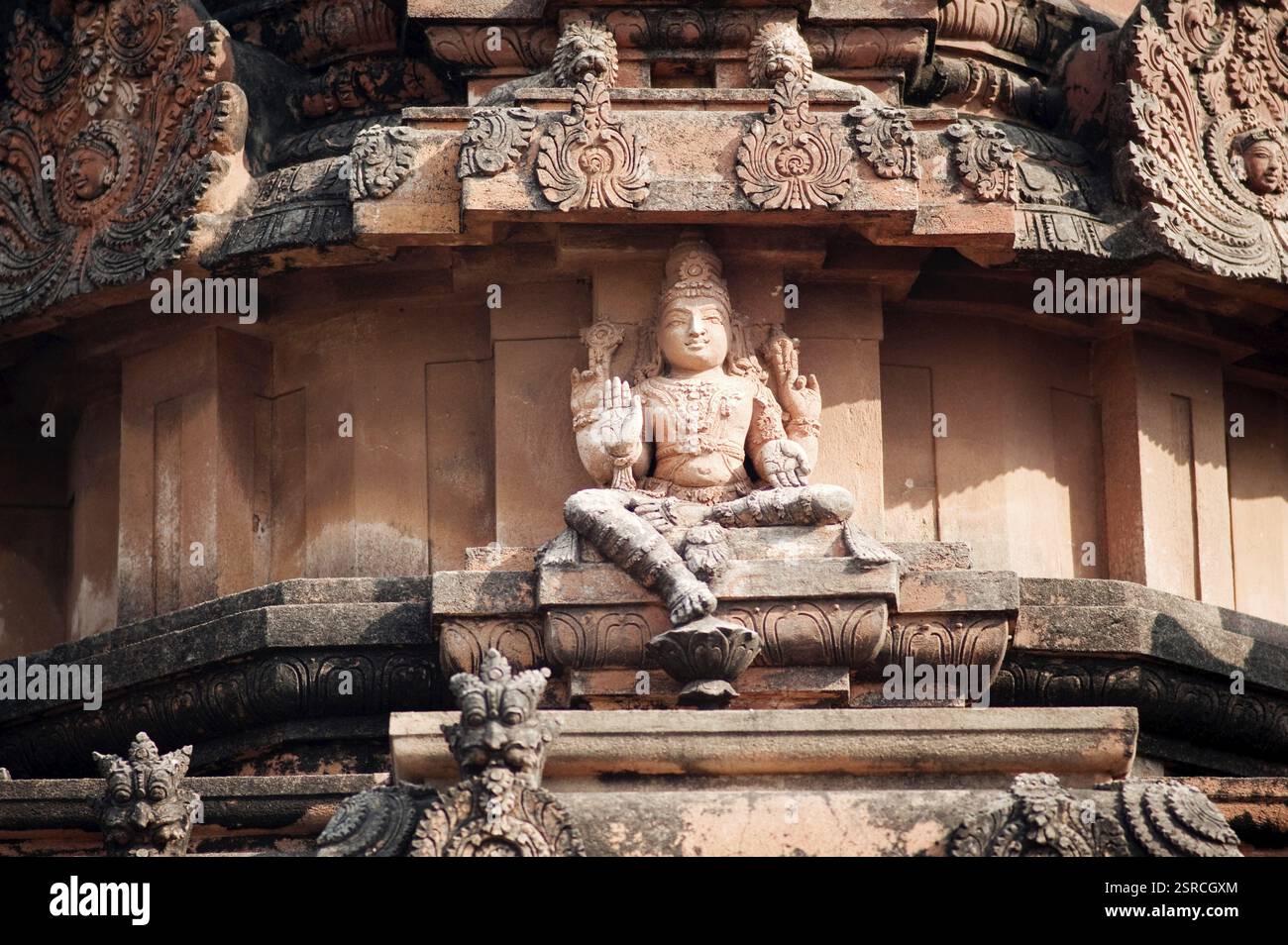 Sculpture of god and goddesses on the peak of krishna temple, Hampi ...