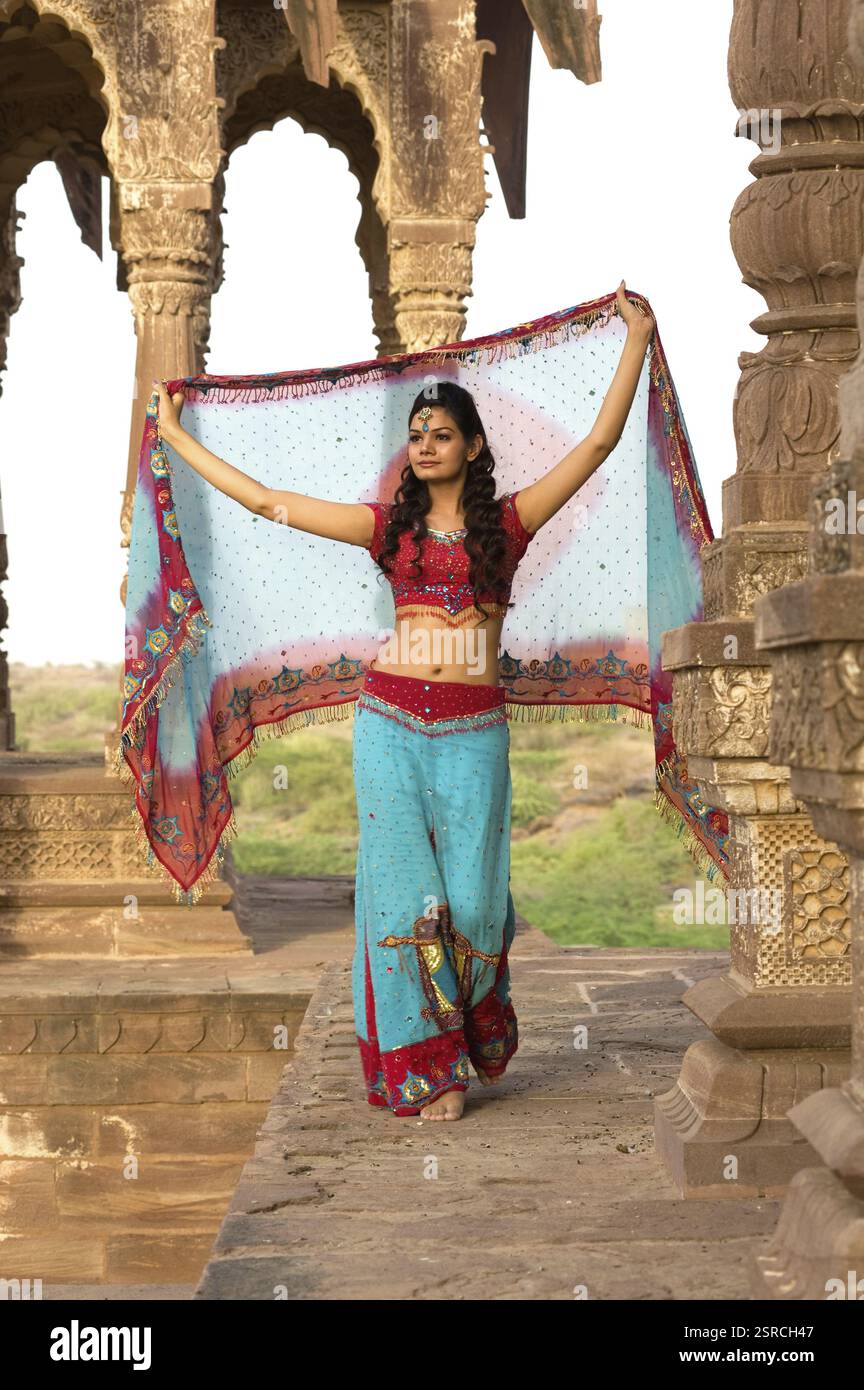 Women in traditional attire stroll hi-res stock photography and images ...