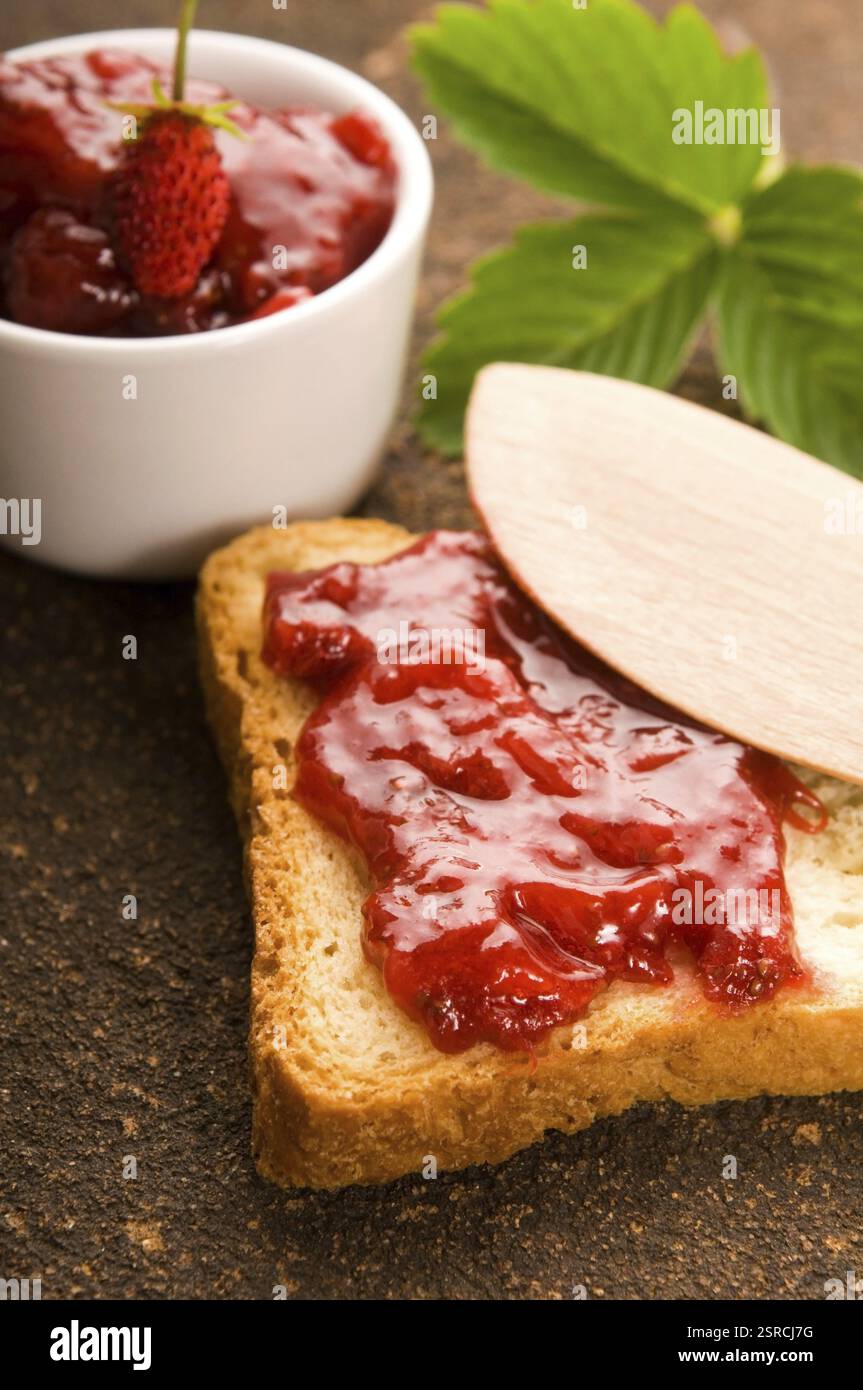Wild strawberry jam with toast, POLAND Stock Photo - Alamy