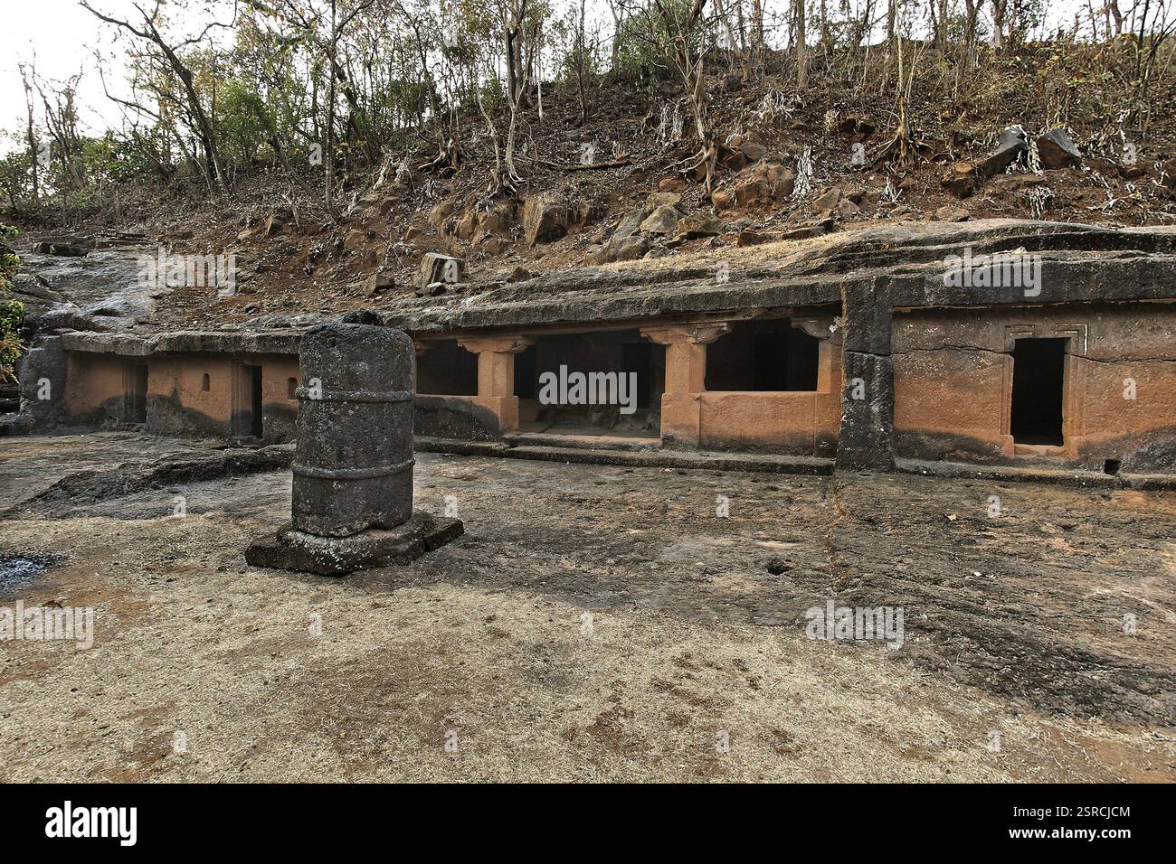 View of caves twelve number with stupa in courtyard opposite entrance ...