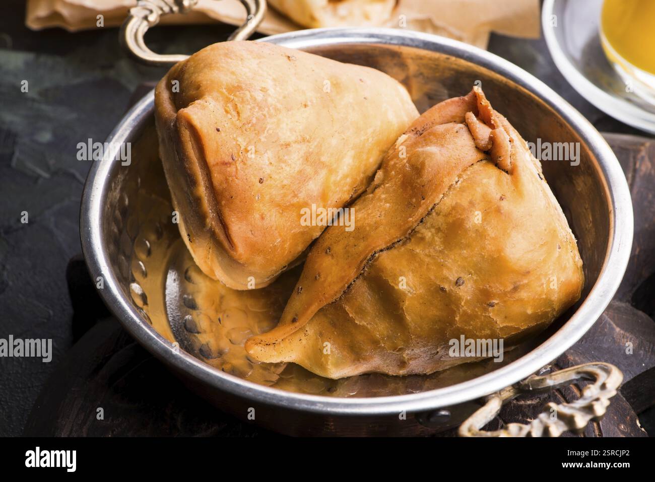 Veg Samosa - is a crispy and spicy Indian triangle shape snack Stock ...