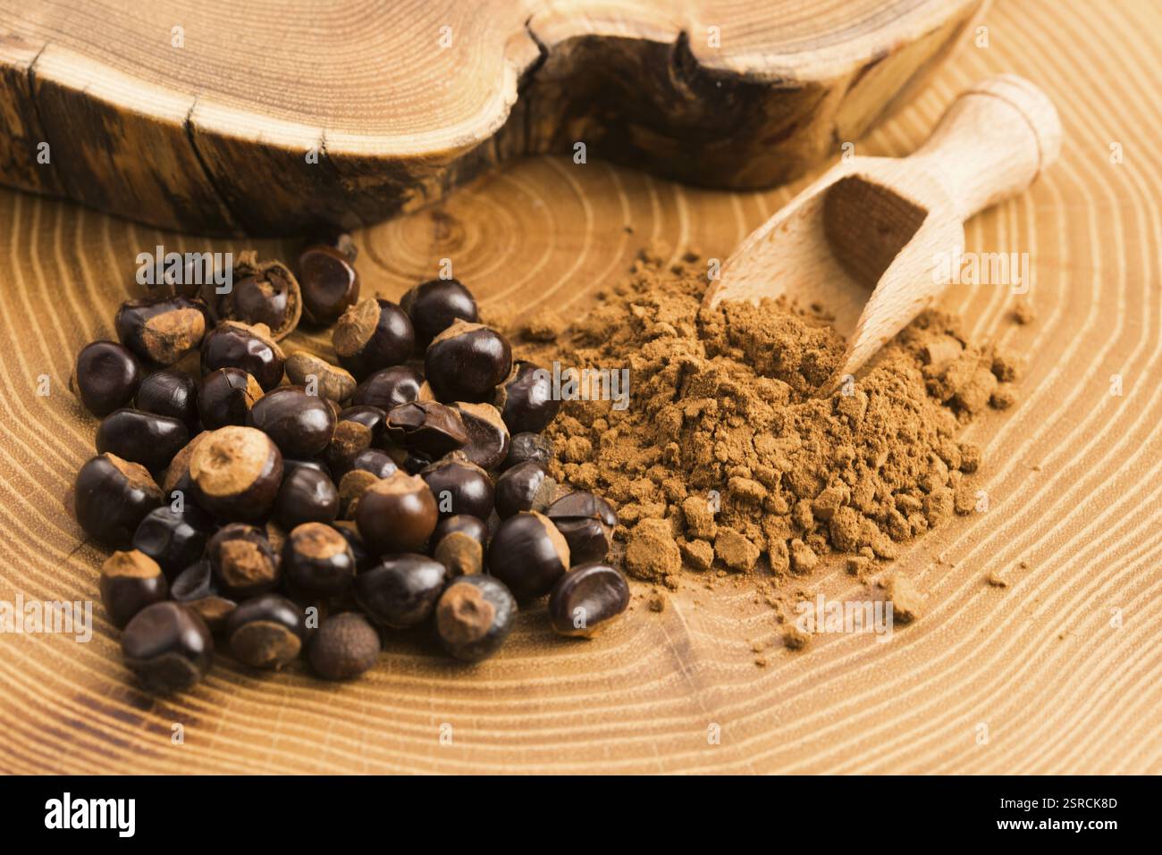 Guarana seeds and powder Stock Photo - Alamy