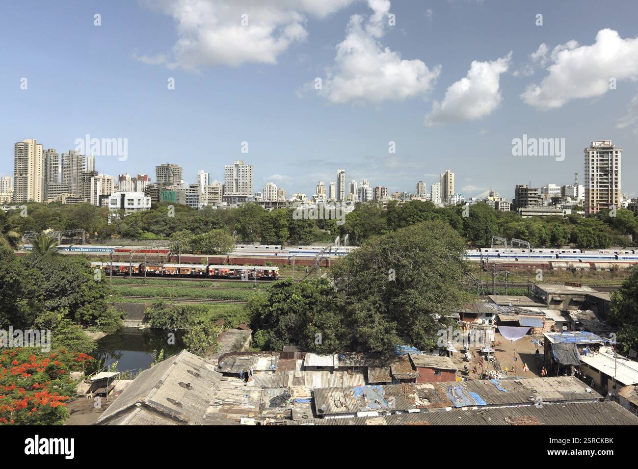 Slum of central and western dadar divided by railway lines, Bombay ...