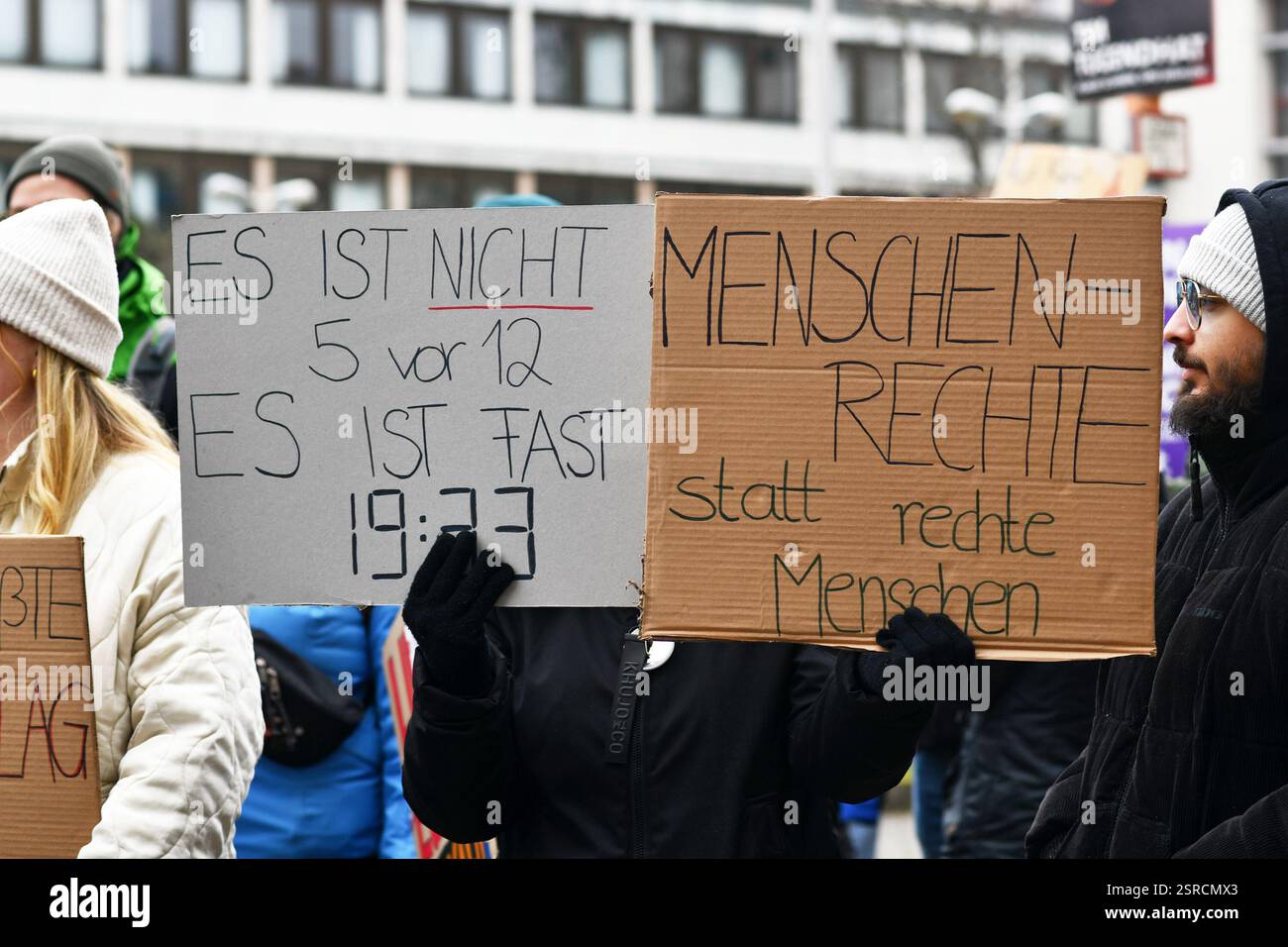 Heidelberg, Germany - February 12th 2025: People with signs with text ...