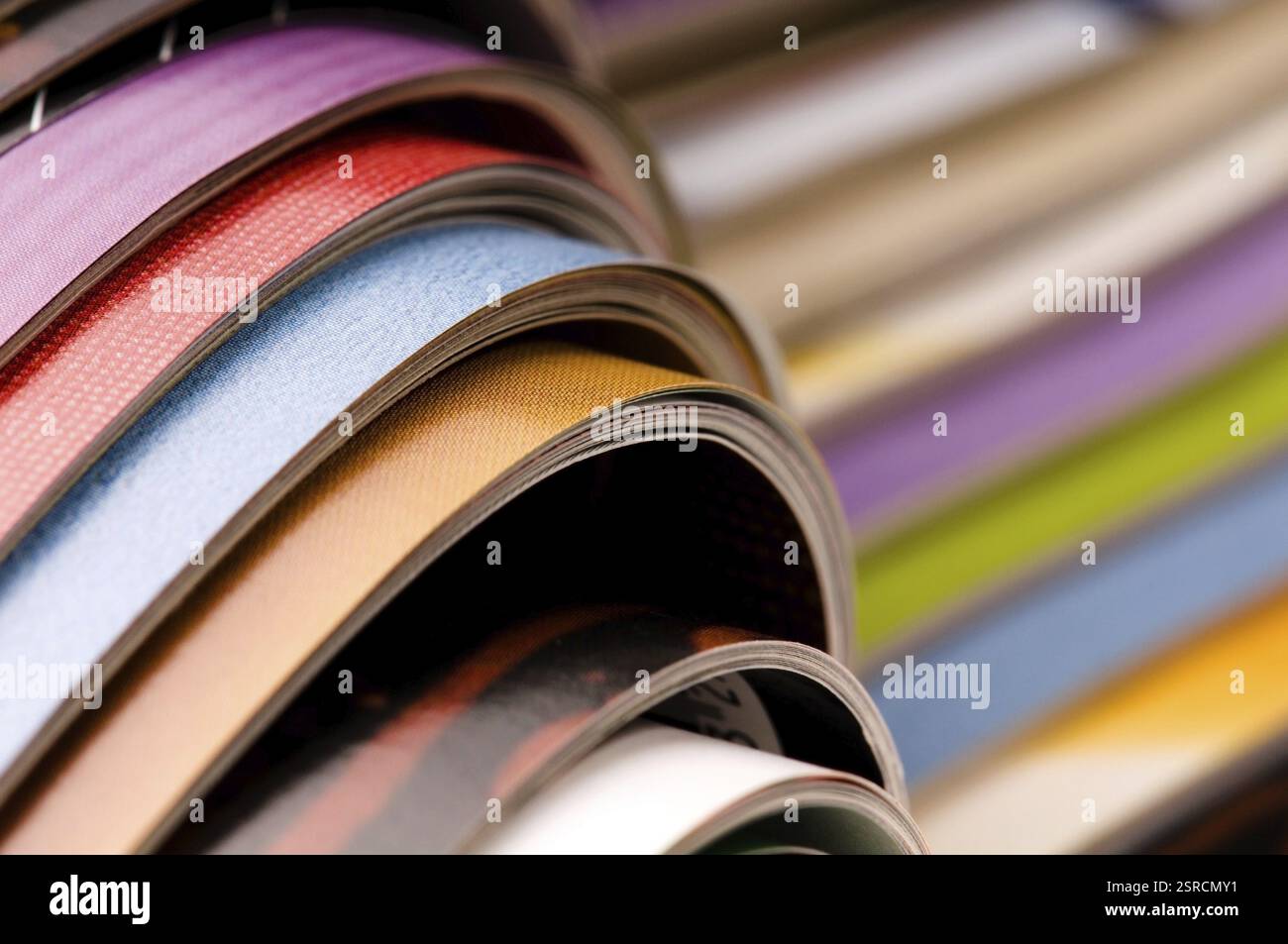 Stack of open magazines Stock Photo - Alamy