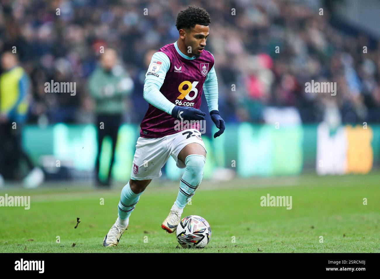 Preston, UK. 15th Feb, 2025. Marcus Edwards of Burnley dribbling ...