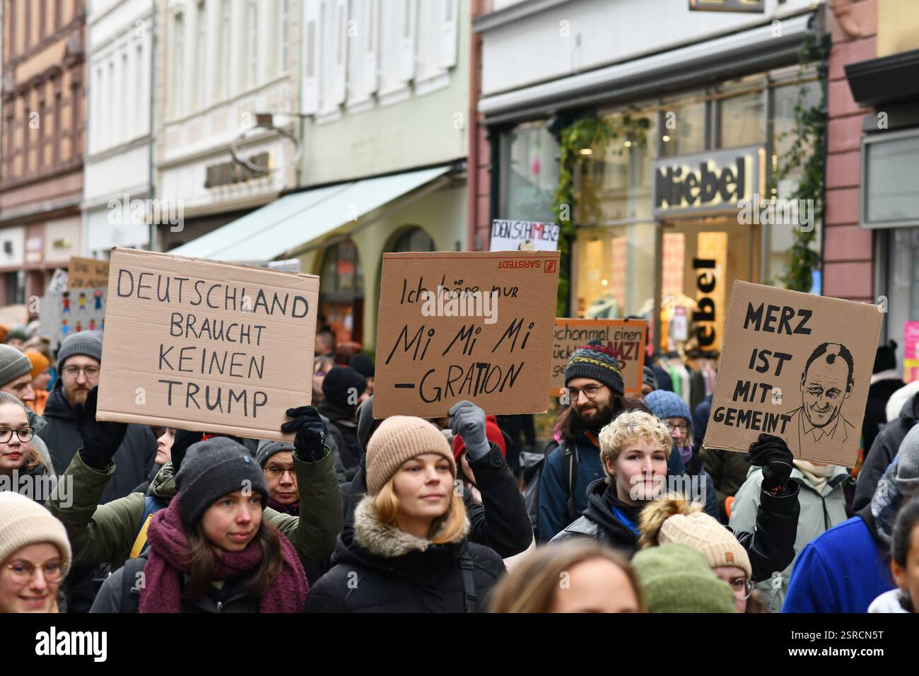 Heidelberg, Germany - February 12th 2025: People with signs in crowd at ...