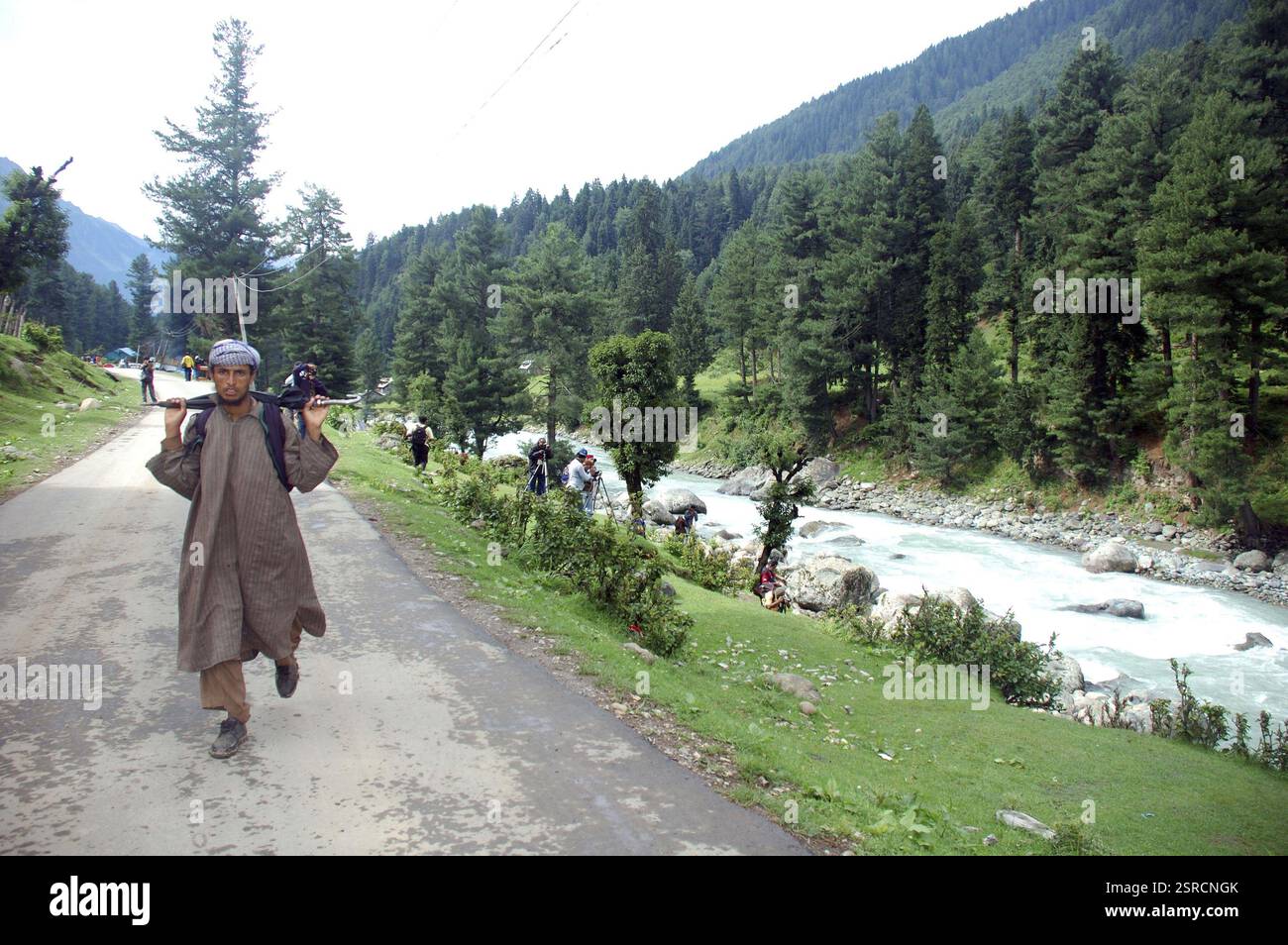 A man walking on road, Pahalgam, Jammu & Kashmir, India, Asia Stock ...