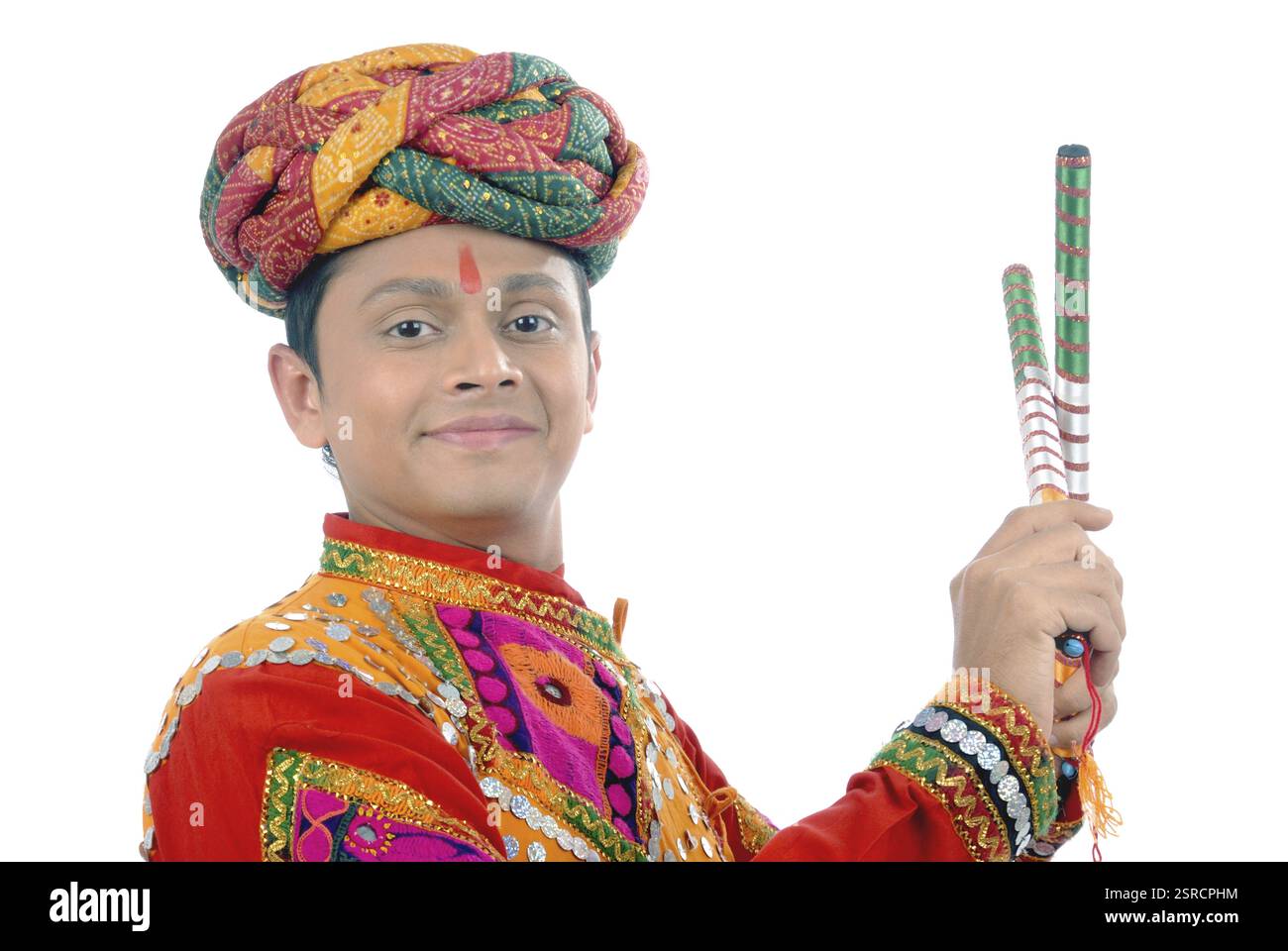 Men playing dandiya hi-res stock photography and images - Alamy