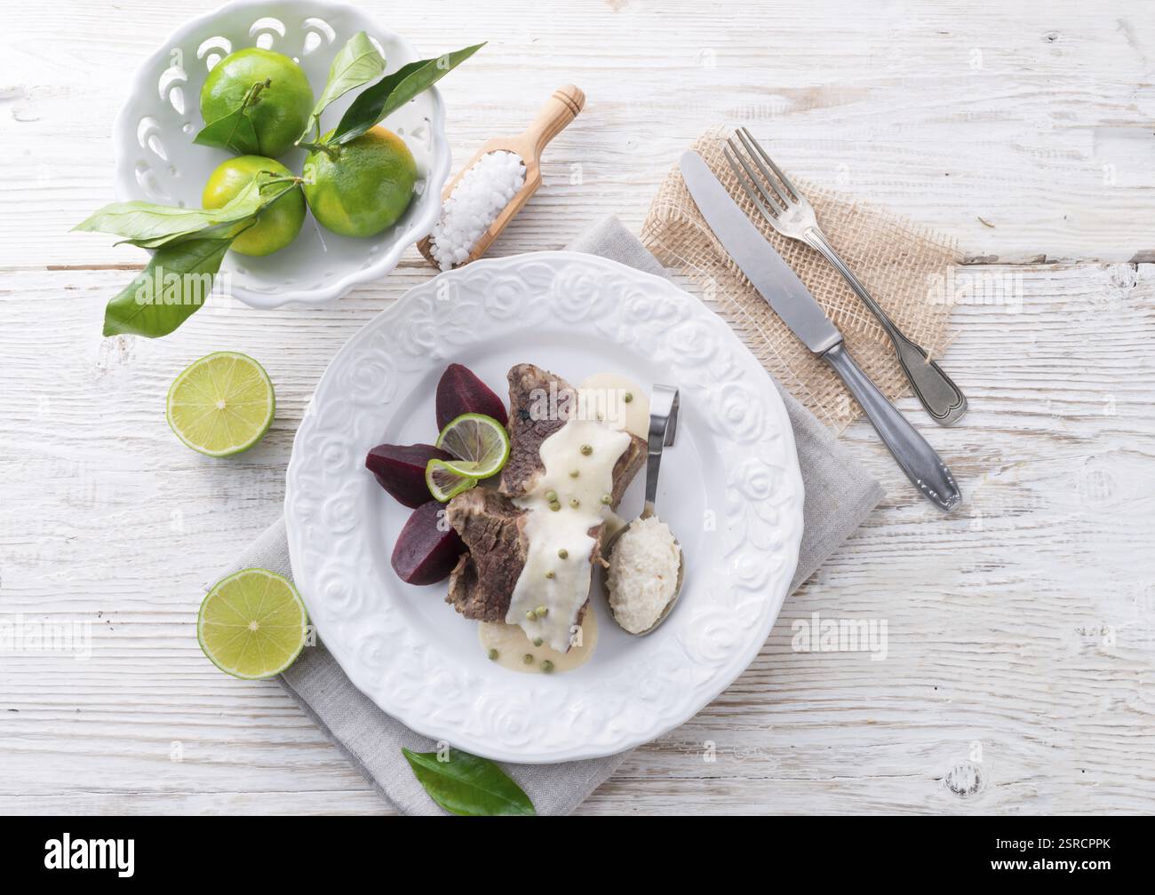 Beef with beetroot and horseradish sauce Stock Photo - Alamy