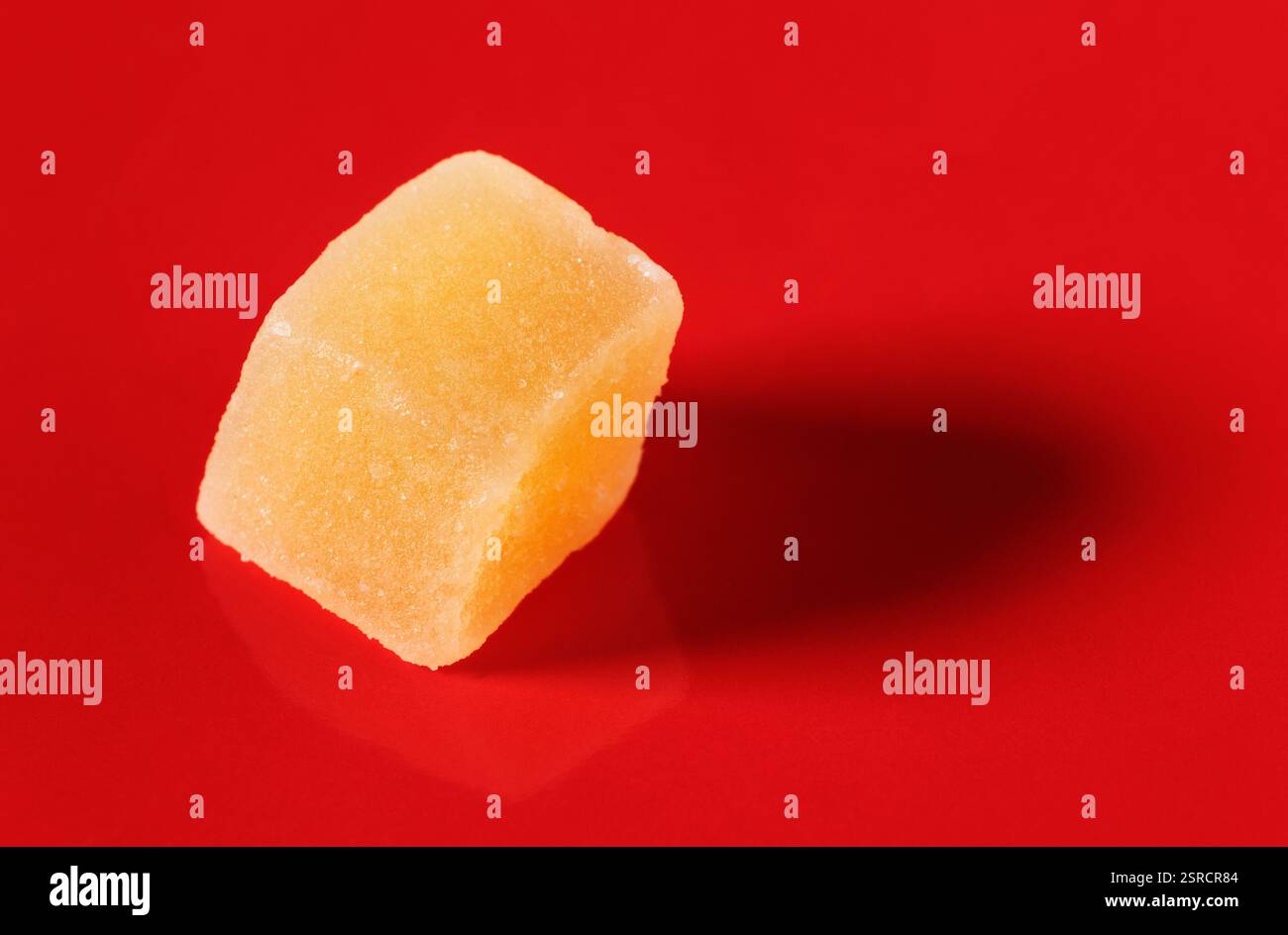 Traditional candy of candied ginger root , yellow spicy taste bonbon ...