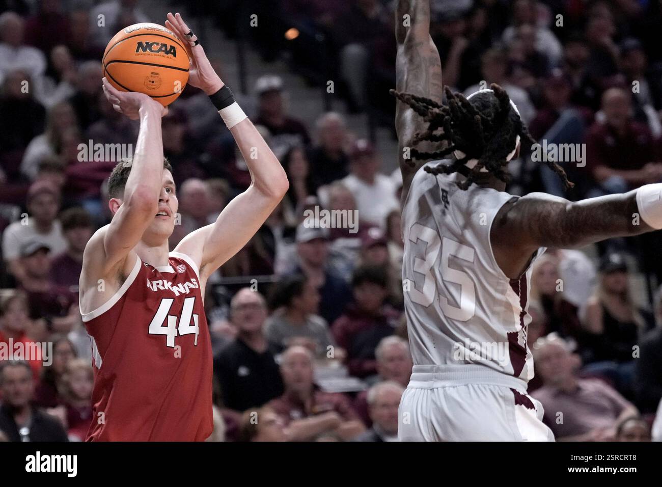 Arkansas forward Zvonimir Ivisic (44) makes a three point basket over ...