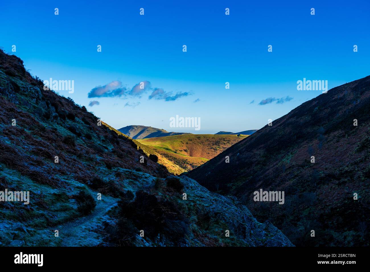 Dramatic Carding Mill Valley: Rugged Hills and Vibrant Horizon Under a ...