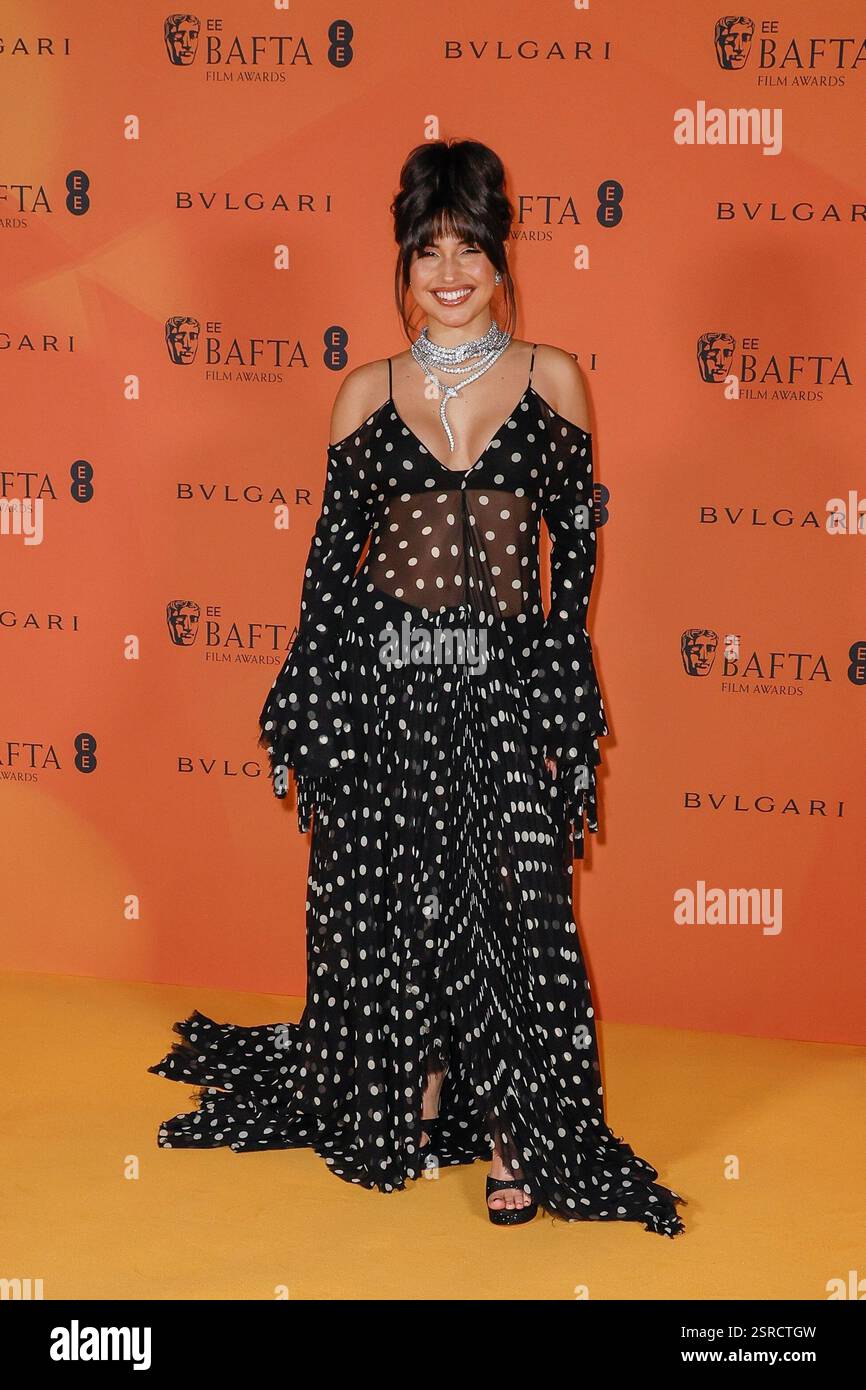 Mabel poses for photographers upon arrival at the BAFTA Nominees Party ...