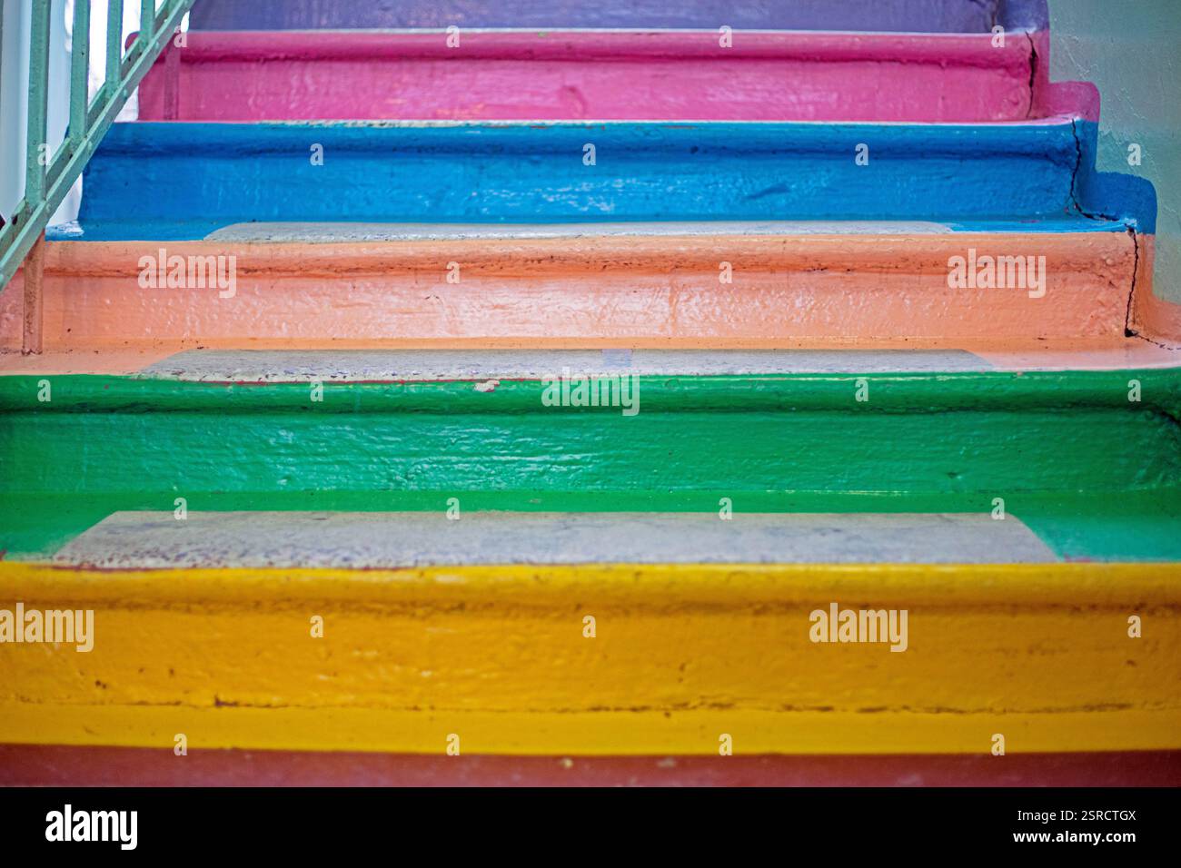 rainbow paint concrete steps up and down Stock Photo - Alamy