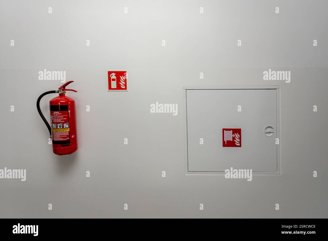 Fire Safety Equipment along with easily visible Emergency Exit Signage ...