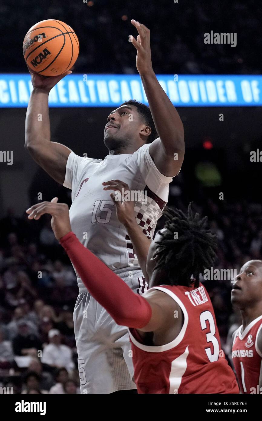 Texas A&M forward Henry Coleman III (15) gets a rebound against ...