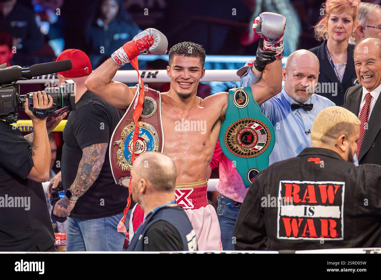 February 14, 2025, New York, New York, USA: XANDER ZAYAS (pink and ...