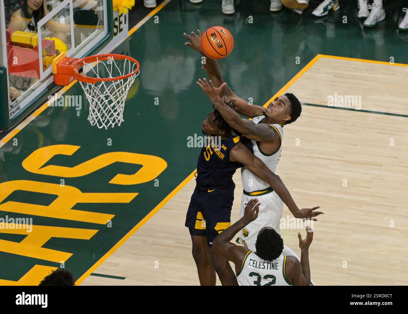 February 15, 2025: West Virginia Mountaineers guard Toby Okani (5) and ...