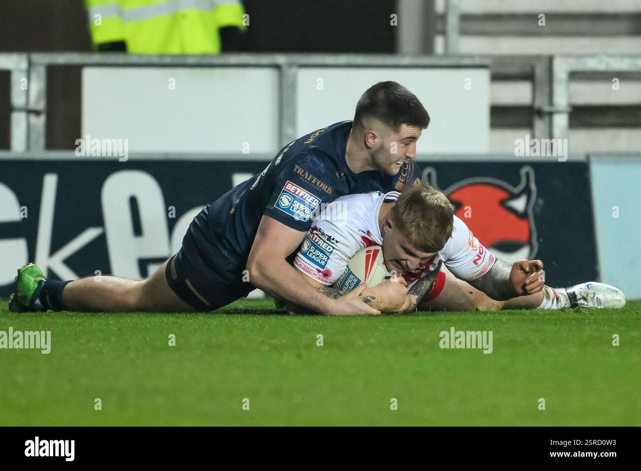 George Delaney of St. Helens goes over for a try during the Betfred ...