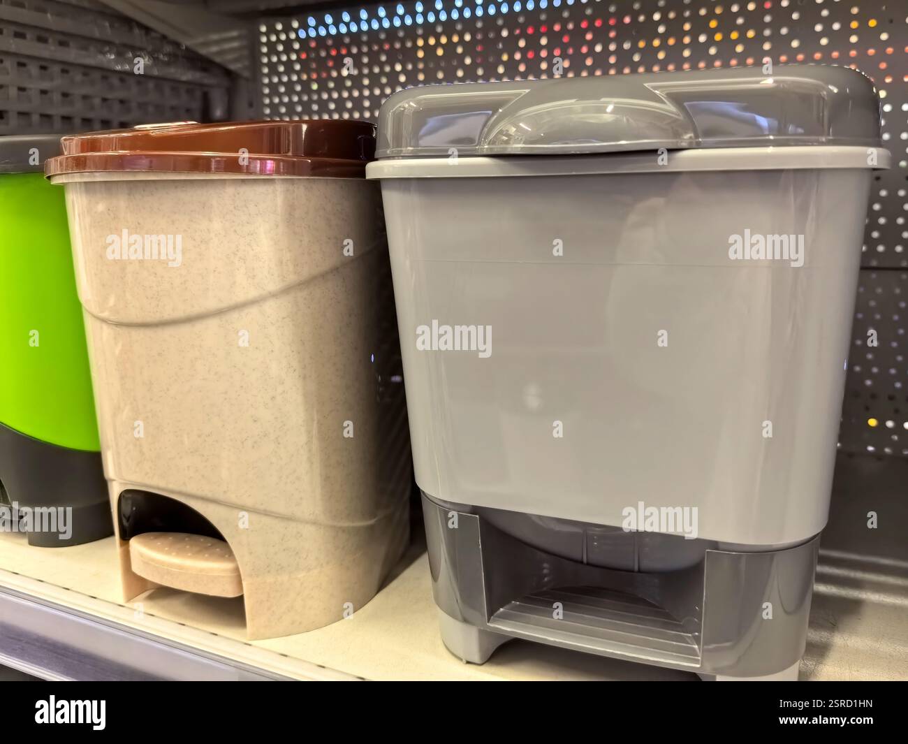 Brightly colored storage containers show variety and design, displayed ...