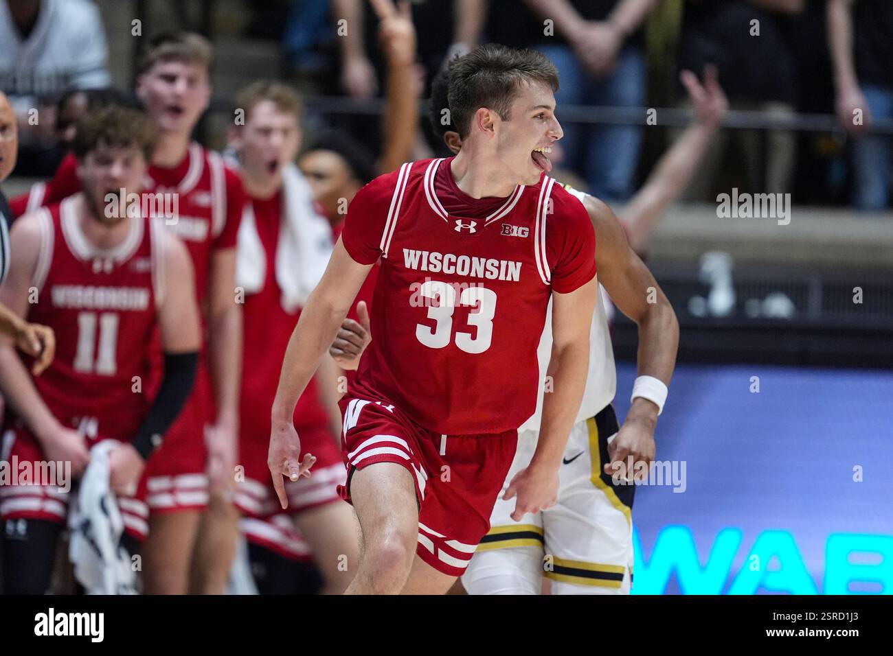 Wisconsin guard Jack Janicki (33) reacts after a basket against Purdue during the second half of ...