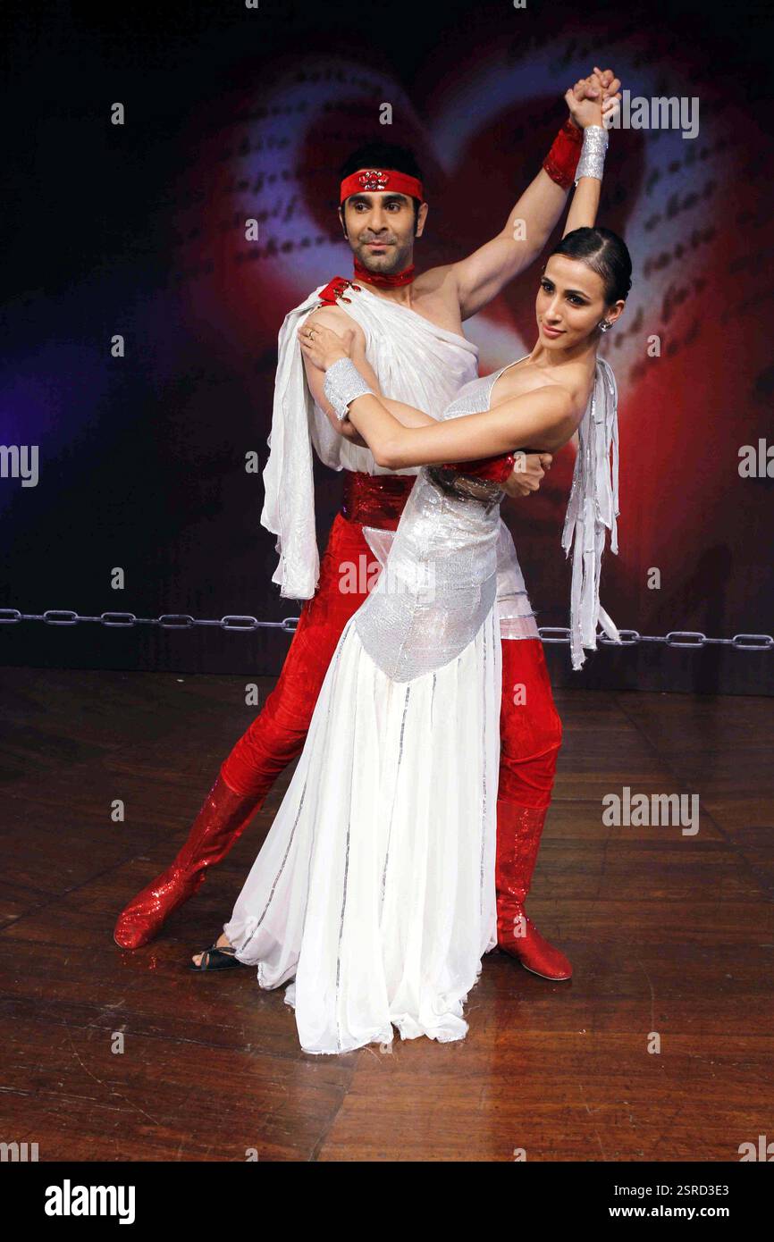 Bollywood choreographer Sandip Soparrkar and model Alesia Raut poses ...