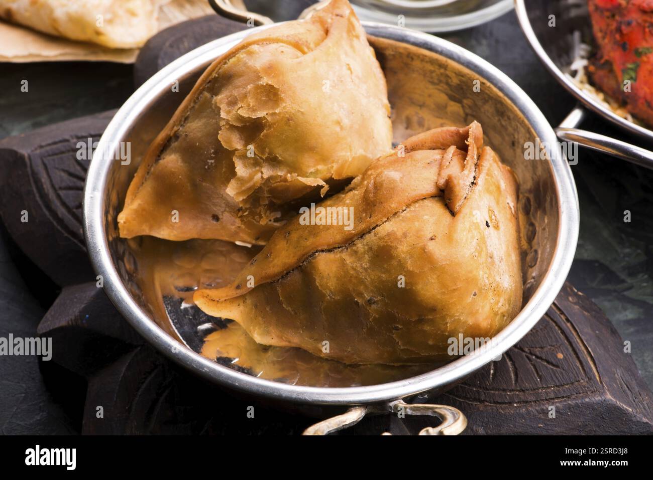 Veg Samosa - is a crispy and spicy Indian triangle shape snack Stock ...