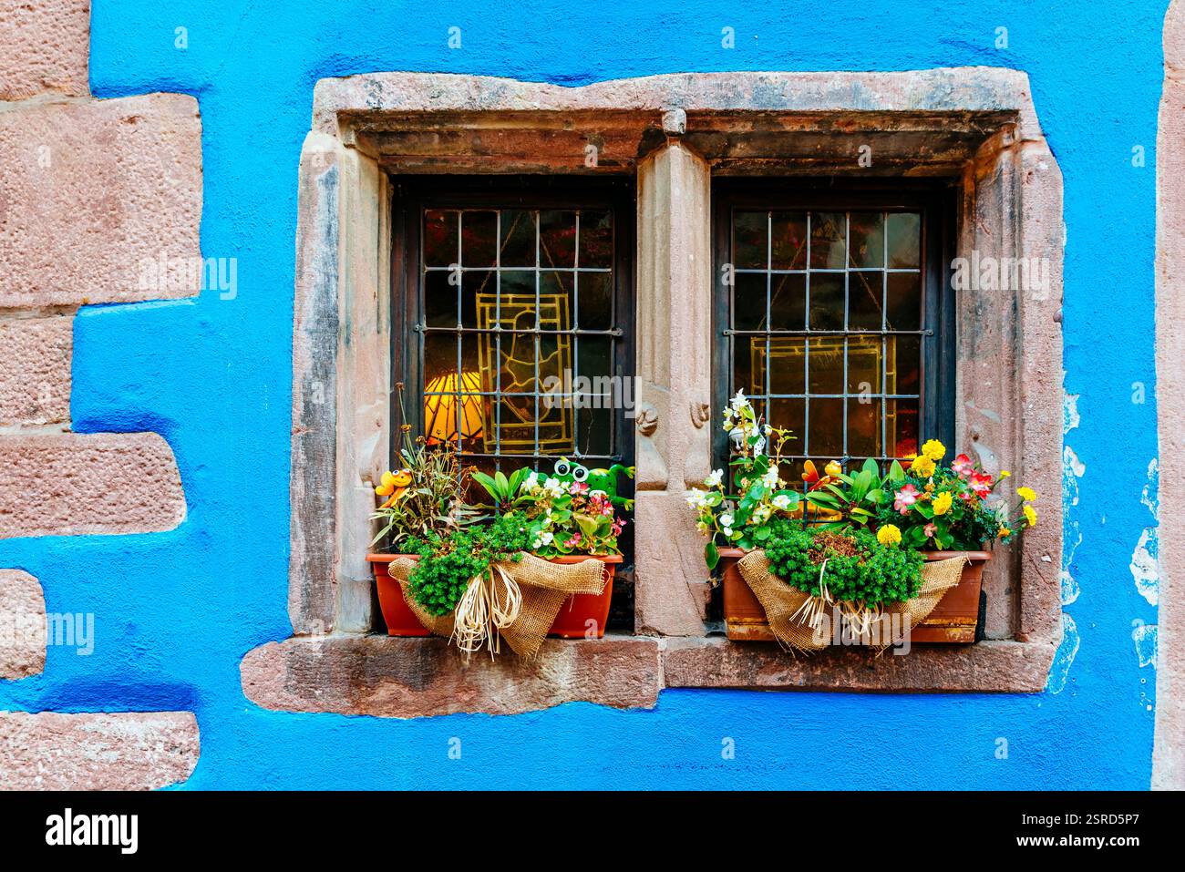 Stone window in blue wall. Riquewihr, Sainte-Marie-aux-Mines, Colmar ...