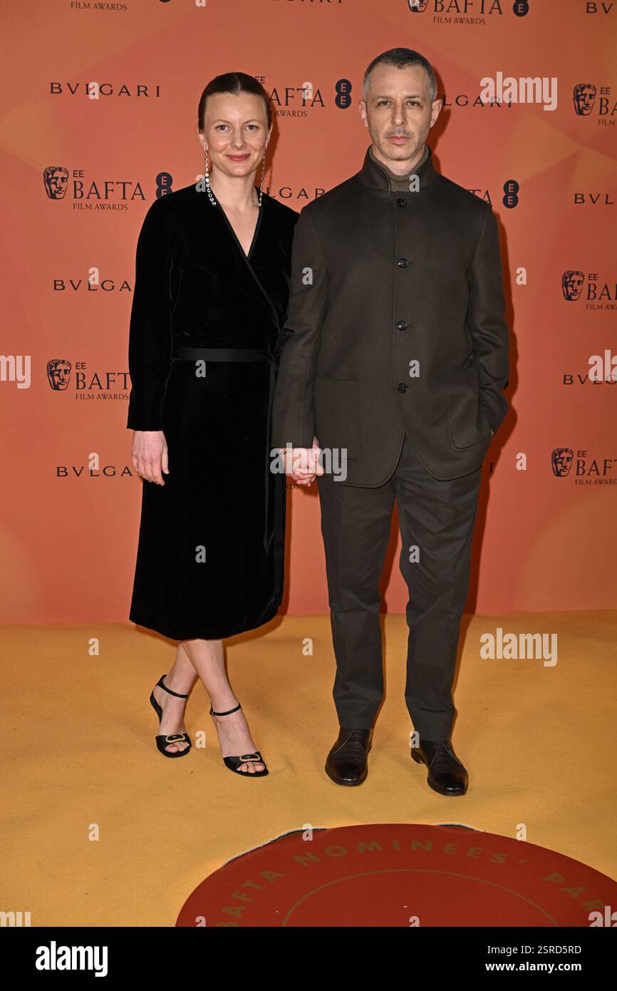 Emma Wall and Jeremy Strong arriving for the EE Bafta Film Awards ...