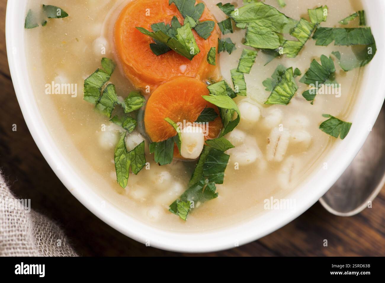 Barley soup, pearl barley in white bowl Stock Photo - Alamy
