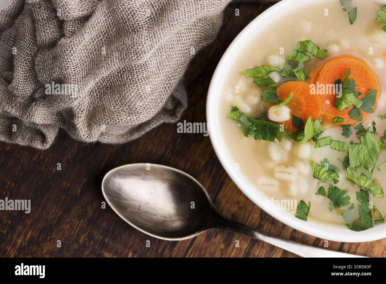 Barley soup, pearl barley in white bowl Stock Photo - Alamy
