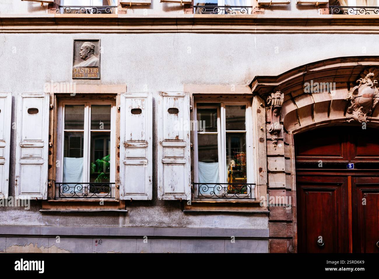 House where Louis Pasteur lived. Commemorative plaque on the building ...