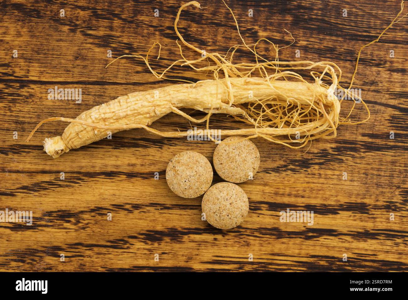 Korean ginseng. Root and pills Stock Photo - Alamy
