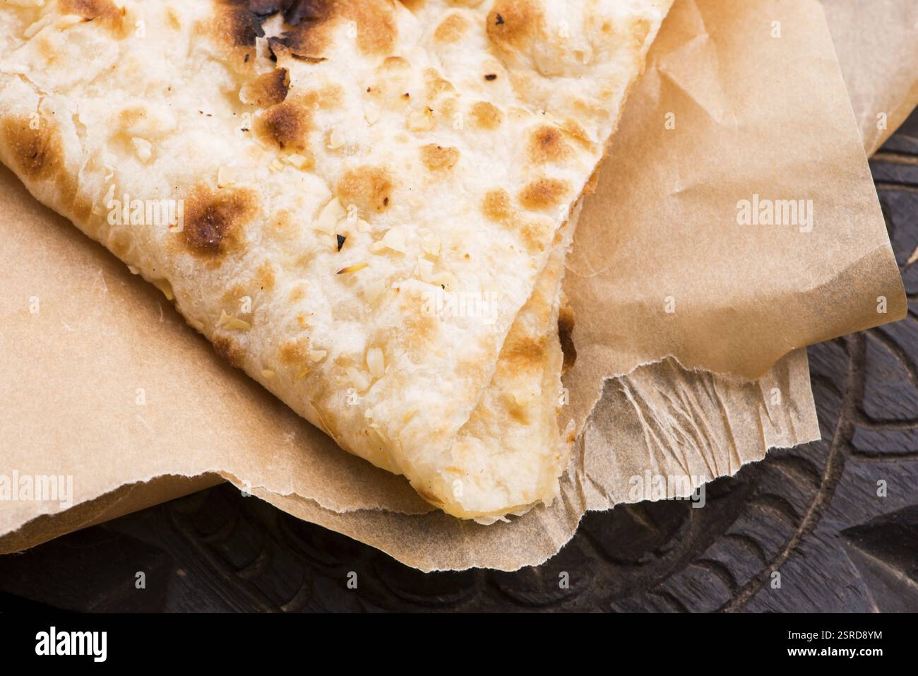 Garlic Naan, Indian flat bread Stock Photo - Alamy